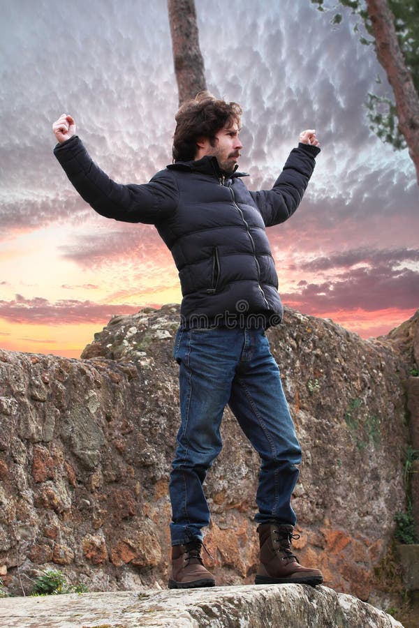 Man on a rock stock photo. Image of stone, freedom, energy - 51669812