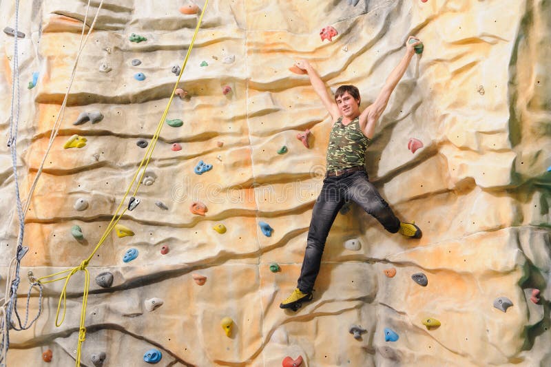 Man on Rock Wall in Sport Center Stock Photo - Image of risk, fitness ...