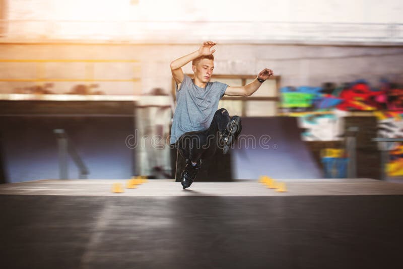 Man on Rollerblades Doing Trick. Stock Image - Image of risk, brave ...