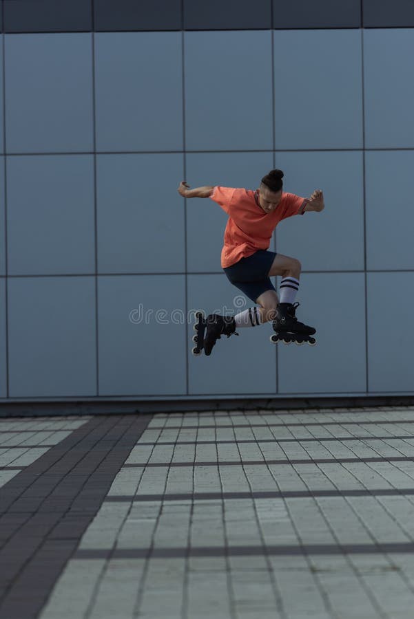 Man in Rollers Training while Jumping Stock Photo - Image of active ...
