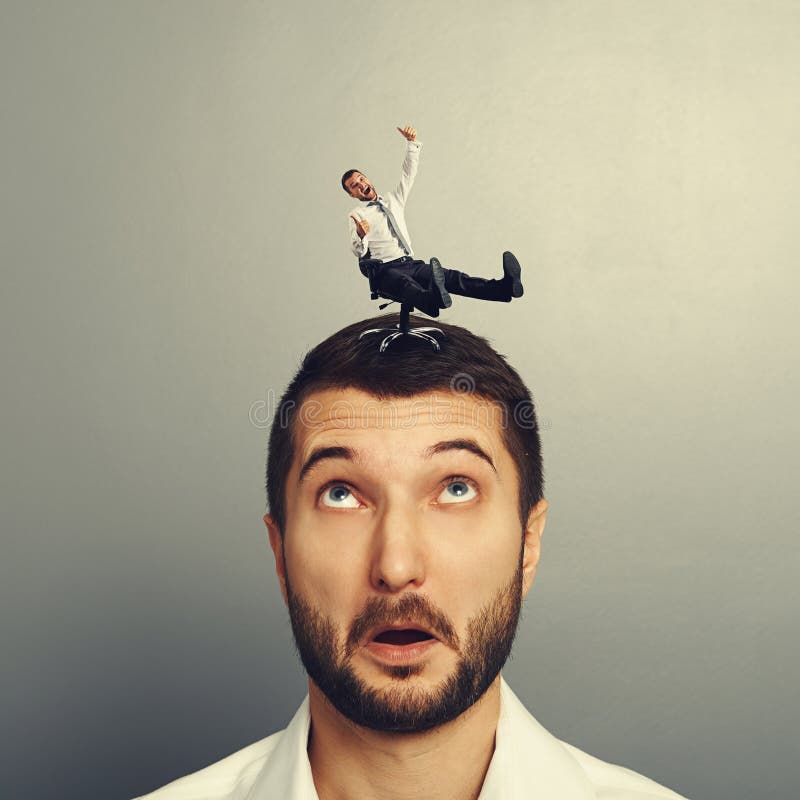 Man Rolling on the Big Head Stock Image - Image of amazed, mind: 36773215