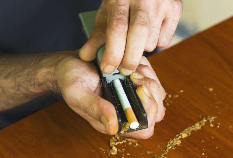 Man Rolling Cigarettes Using Fresh Tobacco Stock Image - Image of habit ...