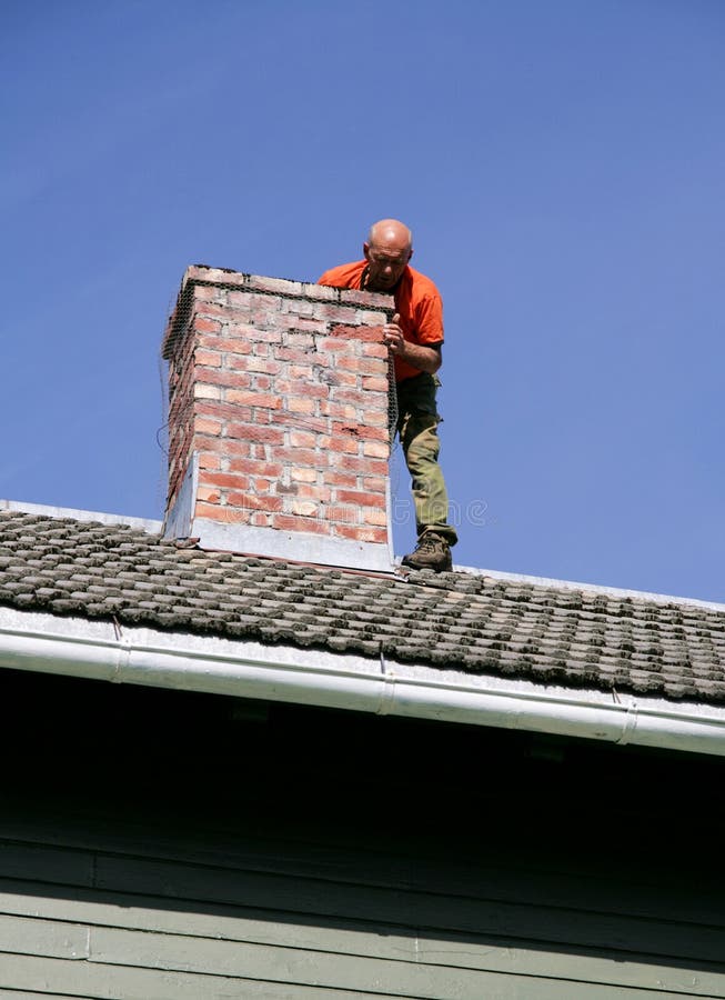 Man on a roof stock image. Image of villa, house, roof - 44184769