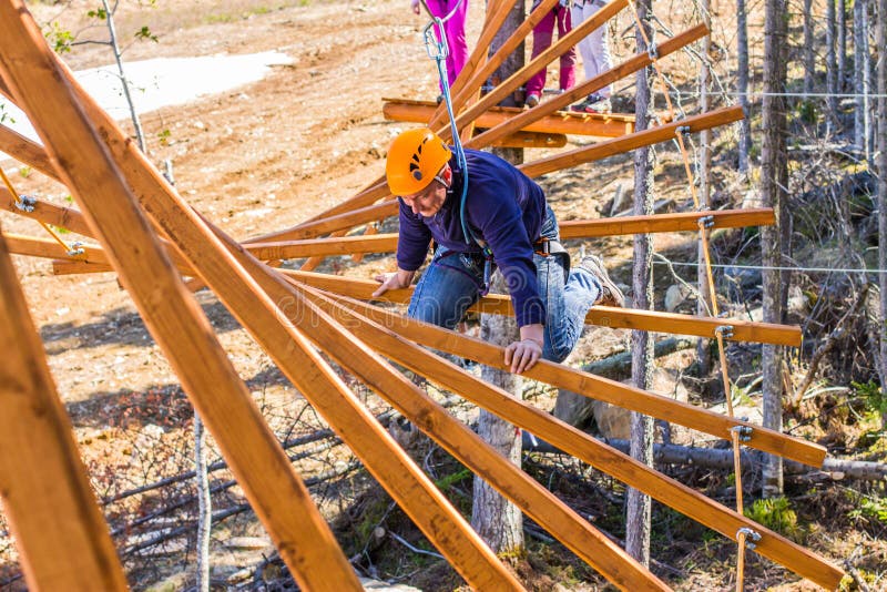 A man in a ropes course stock image. Image of brave, extreme - 73045019