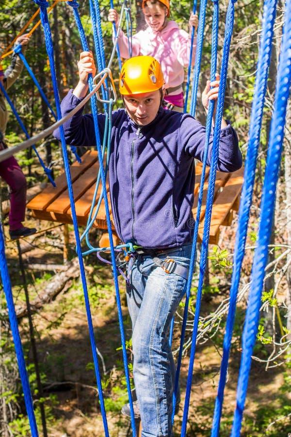 A man in a ropes course stock photo. Image of park, people - 73045316