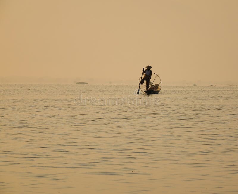 A Man Rowing Boat on Lake in Inle, Myanmar Editorial Photo - Image of ...