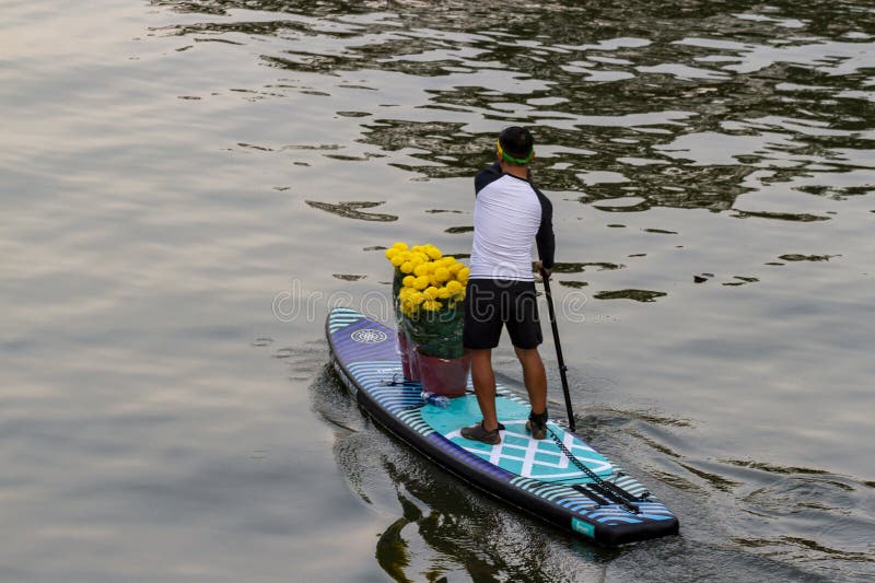 A Man Rowing with SUP (Stand Up Paddleboarding) on River. Stock Image ...