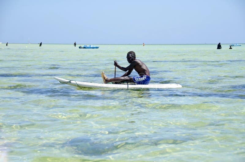 Man rowing vessel editorial stock image. Image of mombasa - 29020969
