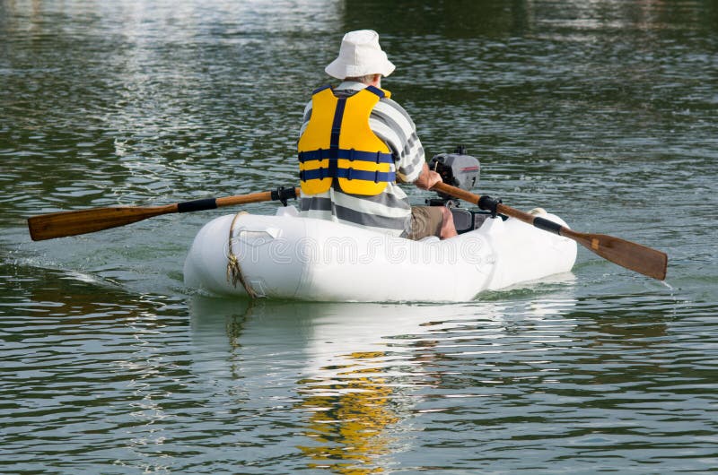 Man rows dinghy boat stock image. Image of peace, harbor - 36246687