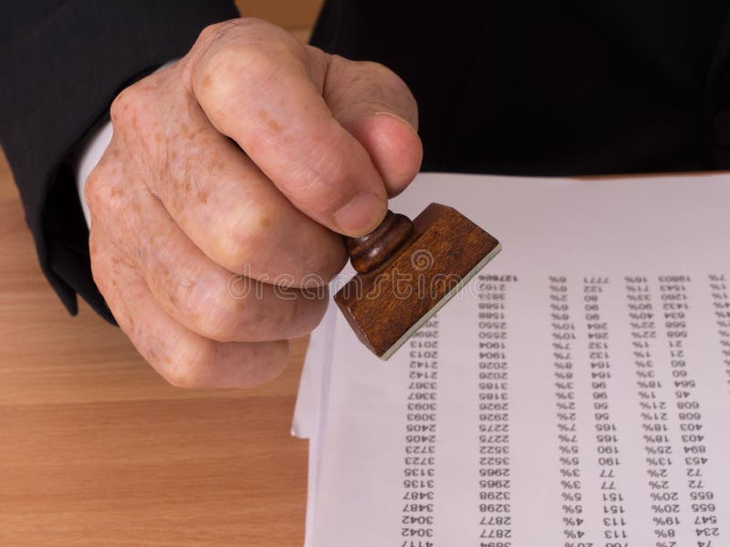 Man with rubber stamp stock photo. Image of authorize - 27199852