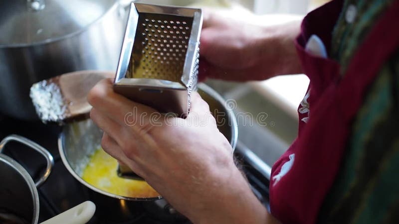 Man rubbing cheese stock video. Video of isolated, closeup - 103390711