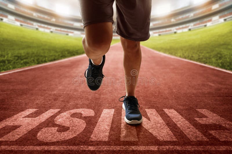 Man running on the track stock image. Image of games - 139703693