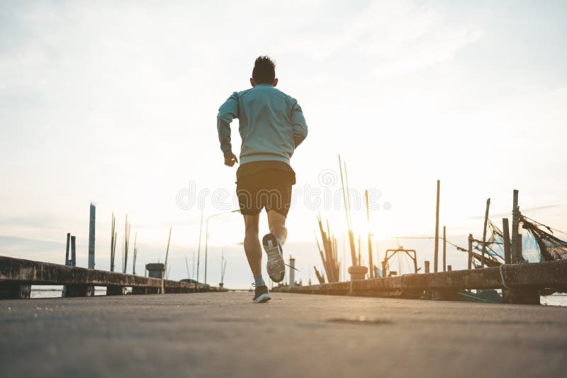 The Man with Runner on the Road in Sunset Stock Image - Image of nature ...