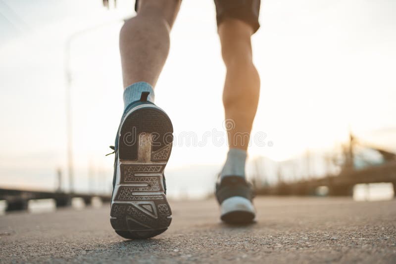 The Man with Runner on the Road in Sunset Stock Image - Image of runner ...