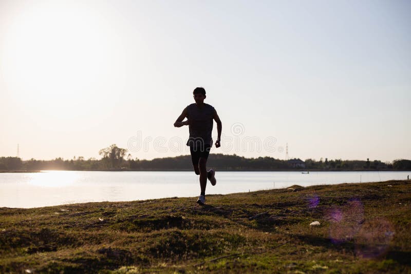 The Man with Runner on the Street Be Running for Exercise Stock Photo ...