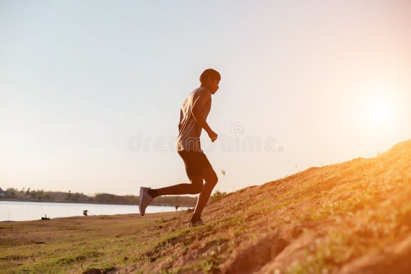 The Man with Runner on the Street Be Running for Exercise Stock Photo ...