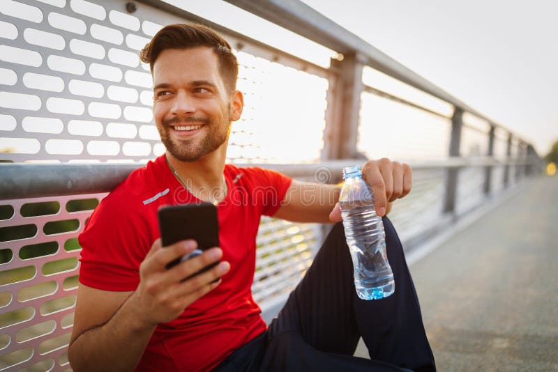 Man Runner Taking a Break during Training Outdoors. Jogger Resting ...