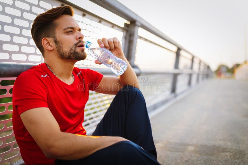 Man Runner Taking a Break during Training Outdoors. Jogger Resting ...