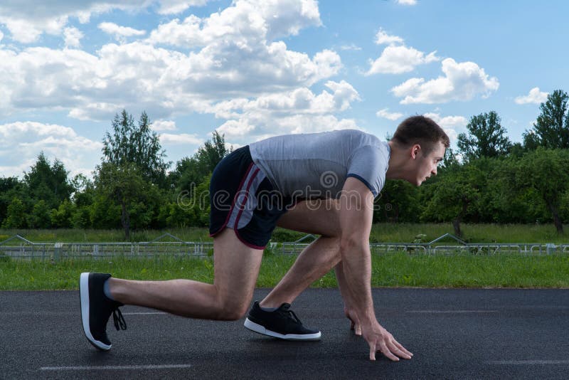 The Man is Running Around the Stadium. Training Outdoors Stock Image ...