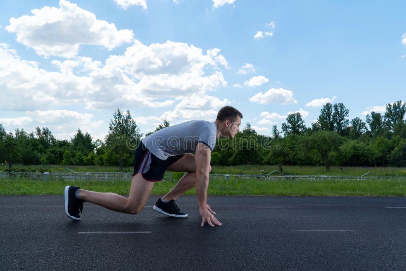 The Man is Running Around the Stadium. Training Outdoors Stock Image ...