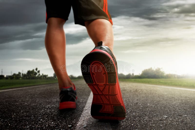Man running on asphalt stock image. Image of activity - 87830523