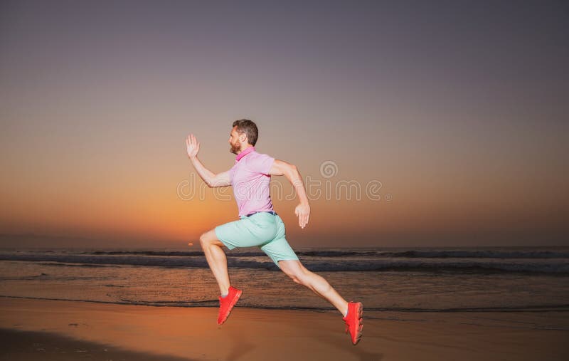 Man Running on the Beach at Sunset. Athletic Young Man Running in the ...