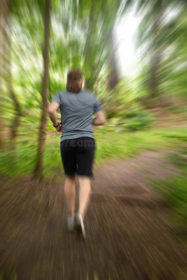Man running in forest stock photo. Image of side, adult - 186994452