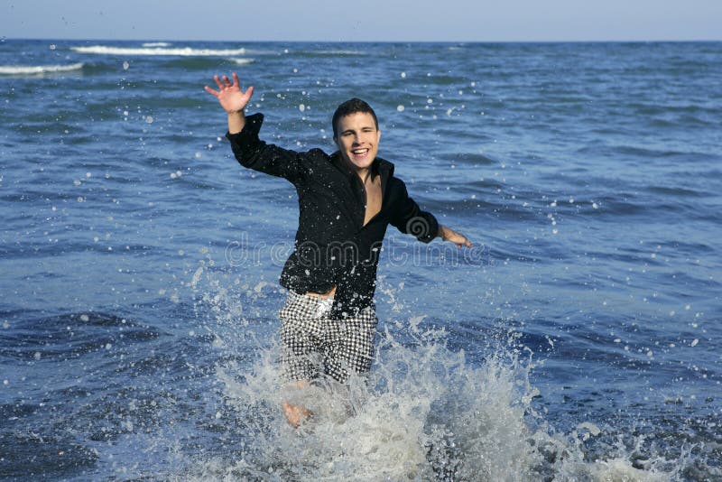 Man Running Happy on the Blue Summer Beach Stock Image - Image of happy ...