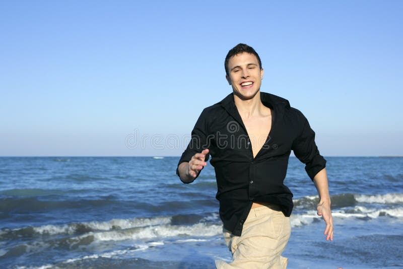 Man Running Happy on the Blue Summer Beach Stock Photo - Image of ...
