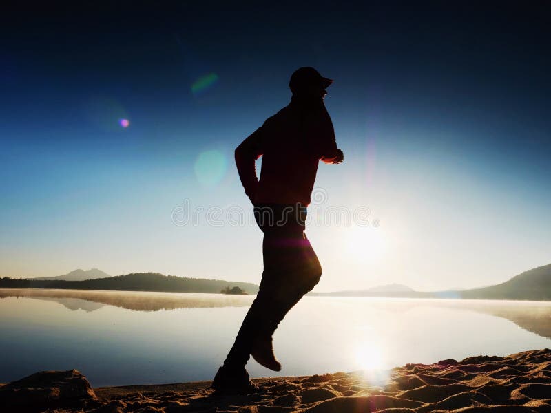 Man Running at Morning Sea. Each Day Morning Workout Stock Photo ...