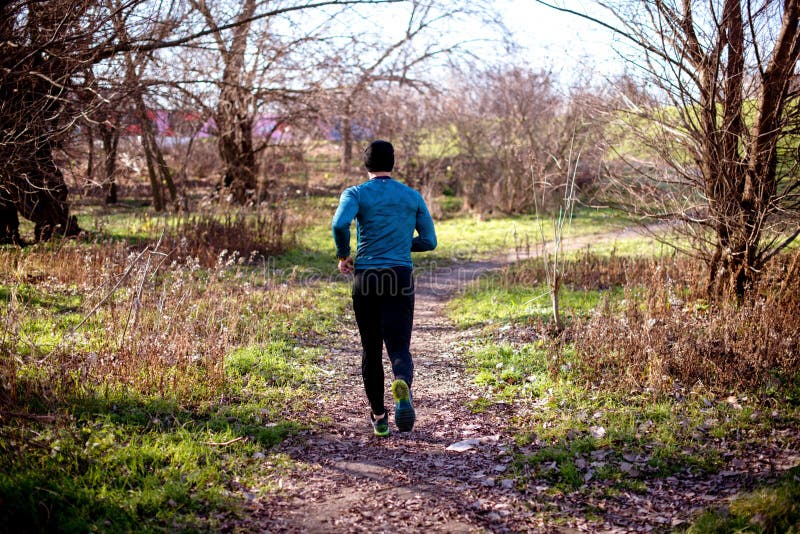 Man running in nature stock photo. Image of males, handsome - 110282558