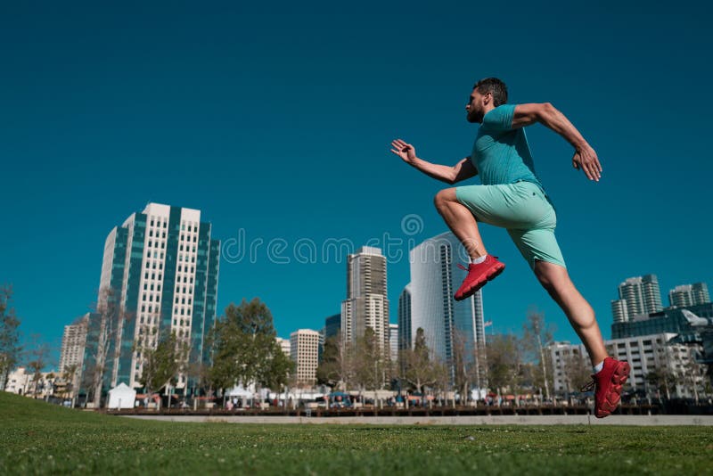 Man Running Outdoors on the Town. Jogging in a City Park. Stock Image ...