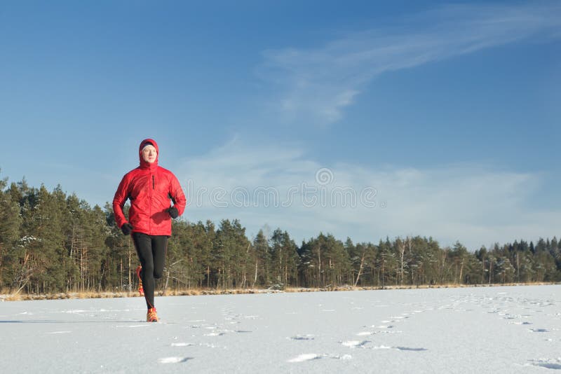 Man Running Outdoors in Winter Snowy Day Stock Image - Image of ...