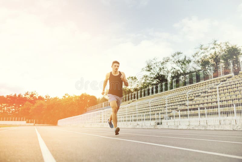 Man Running on a Racing Track Stock Photo - Image of concept, sprinting ...