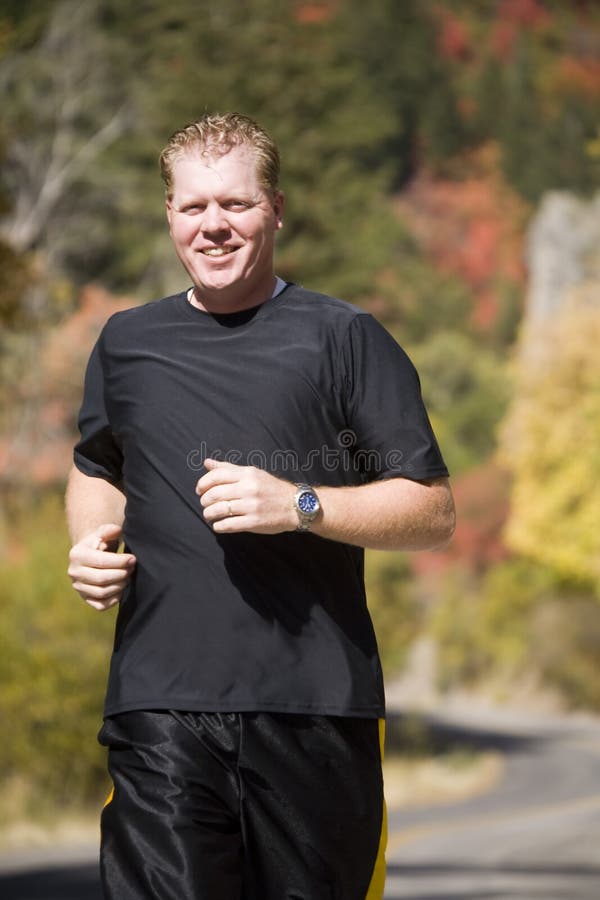 Man running on road stock photo. Image of road, workout - 11233622