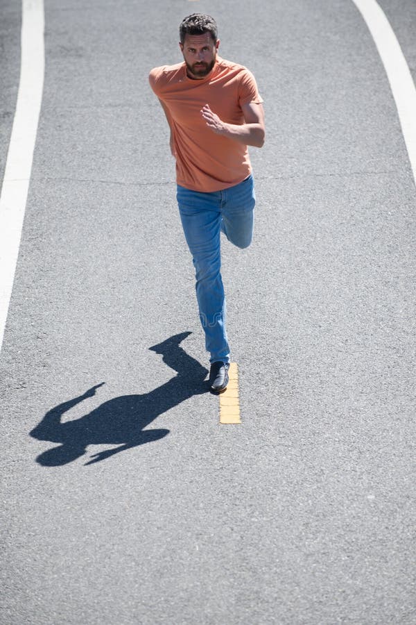 Man Running on the Road. Sporty Man Runner Running in Summer. Stock ...