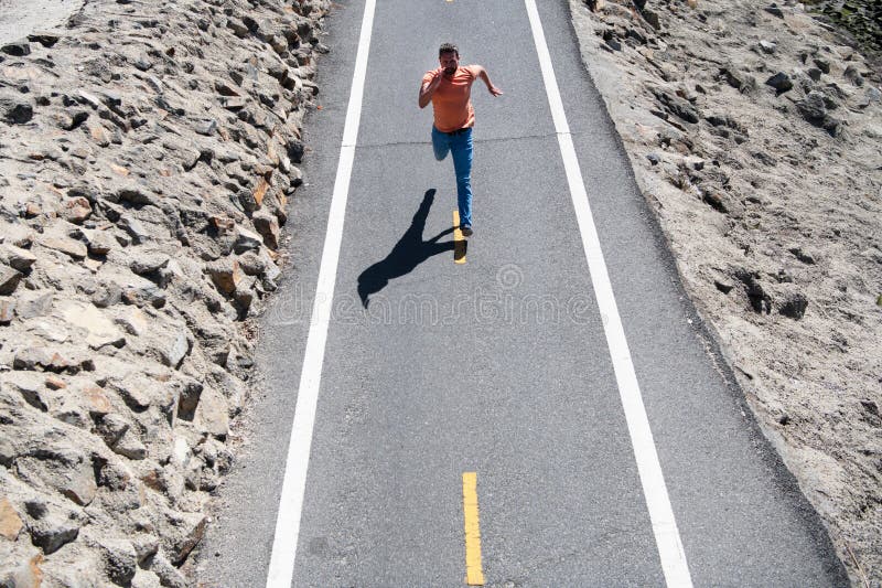 Man Running on the Road. Sporty Man Runner Running in Summer. Stock ...