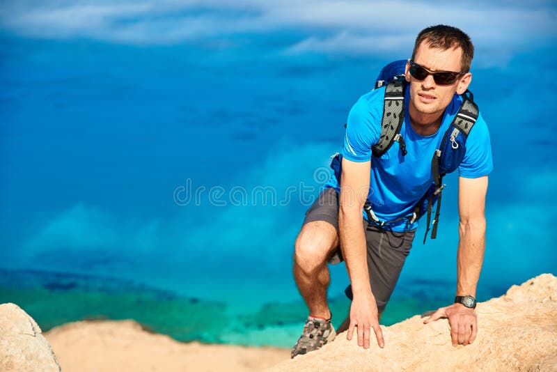 Man running on the rock stock photo. Image of blue, sportsman - 72172794