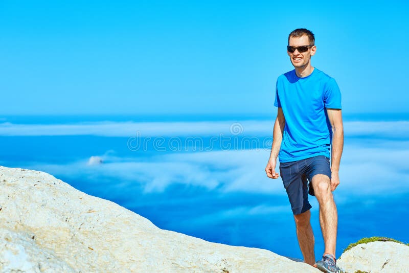 Man running on the rock stock image. Image of athletic - 70274005