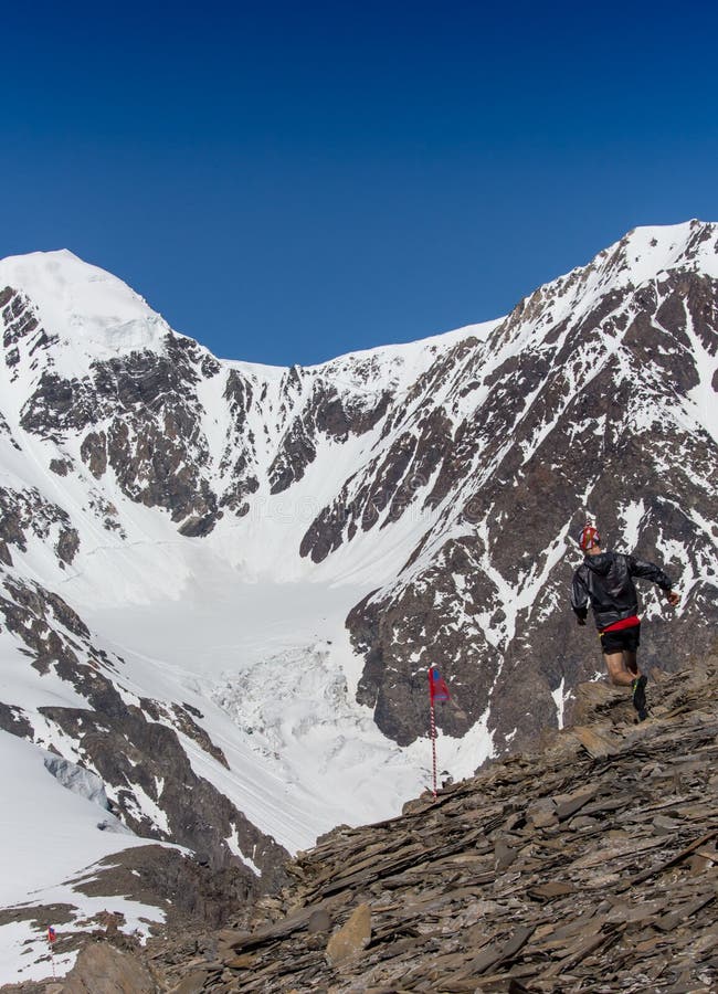 Man Running on a Rural Road during Sunset in the Mountains Stock Photo ...
