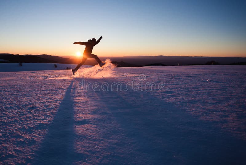 Man Running through Snow in Winter Landscape Stock Photo - Image of ...
