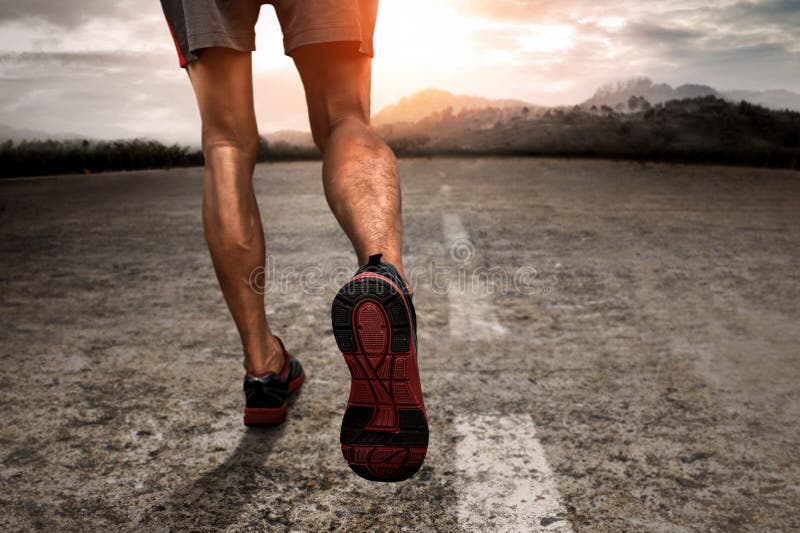 Man running at sunset stock photo. Image of feet, athletic - 91999954