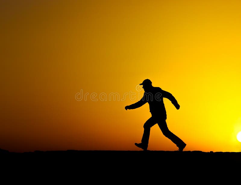 Man running at sunset stock photo. Image of condition - 50129854