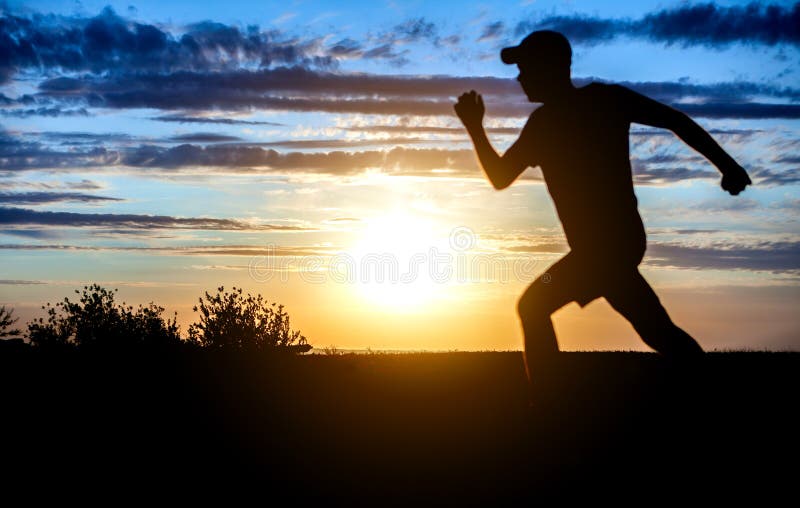 Man running at Sunset stock photo. Image of race, skyline - 59733756