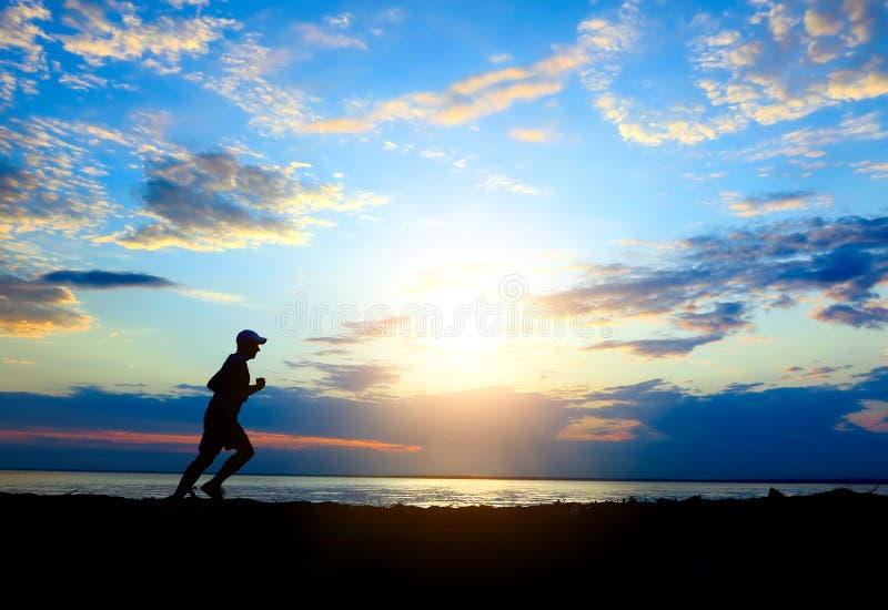 Man running at Sunset stock image. Image of race, rural - 62036473
