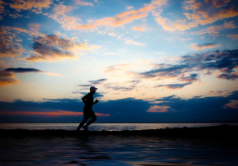 Man running at Sunset stock photo. Image of athletic - 63785152