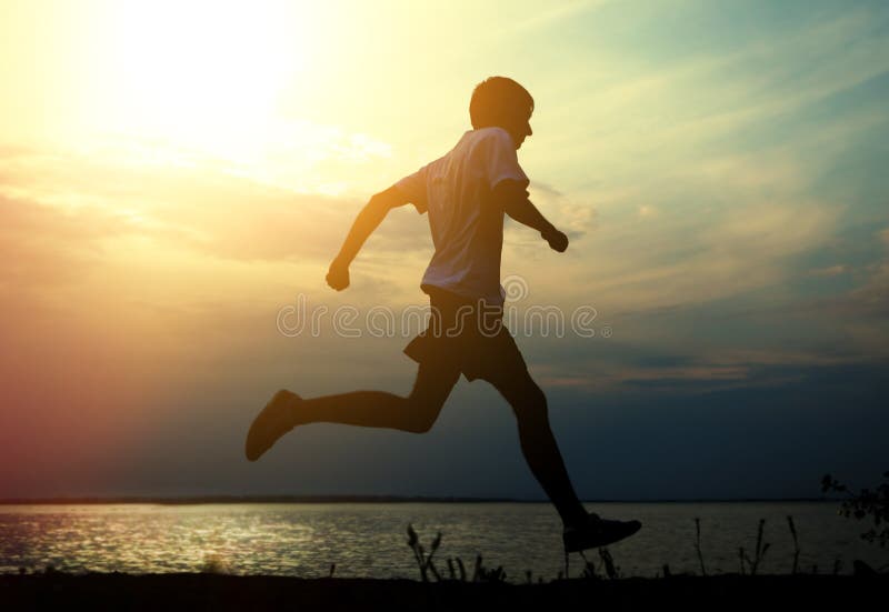 Man running at Sunset stock photo. Image of idyllic, dusk - 72142256