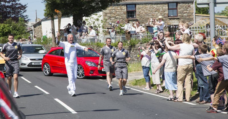 Man running with torch editorial photo. Image of olympics - 28077996
