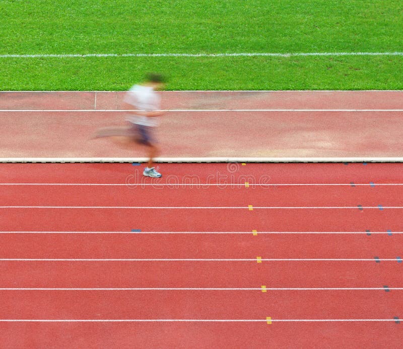 Man running on track stock image. Image of movement, foot - 35688113