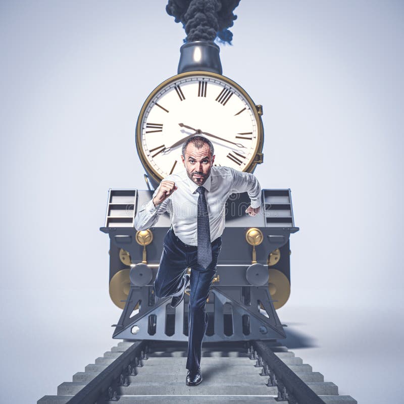 Man Running On The Tracks And Running Away From A Train With A Big ...